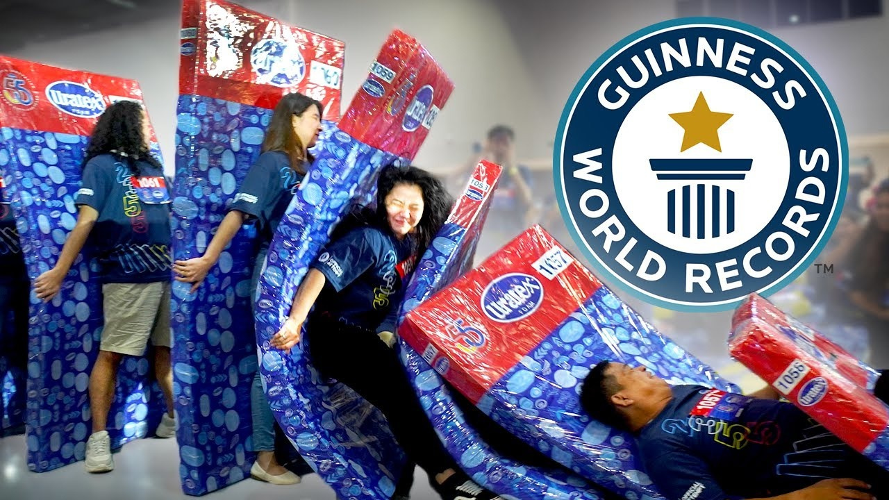 Longest Human Mattress Dominoes EVER! – Guinness World Records - Mover.uz